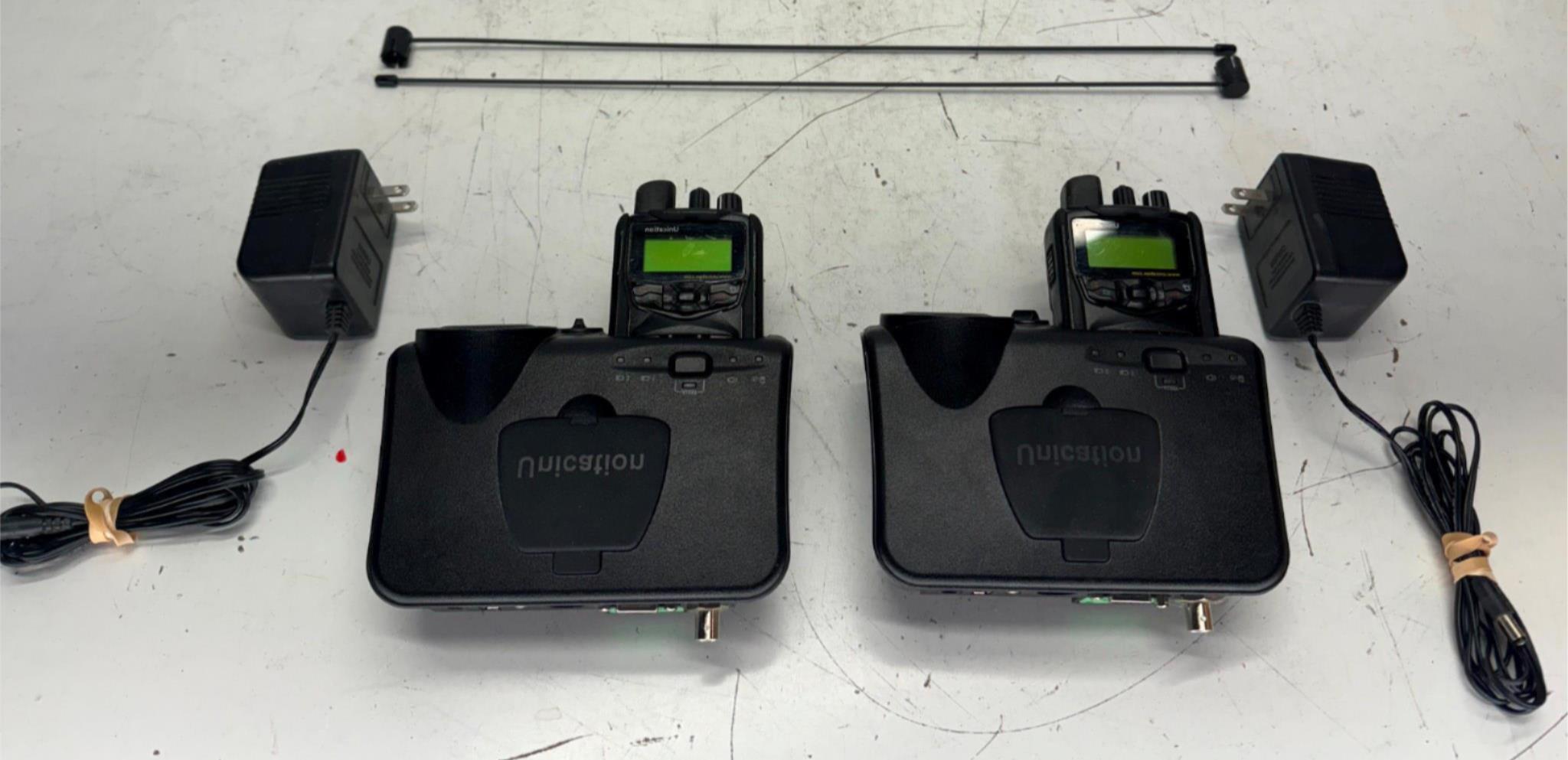 2 Unication G1 VHF Pagers 148-164 MHz w/ Amplified Charger – Used Radios